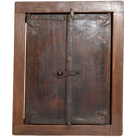 Solid wood and old medieval iron window grille with interior or ...