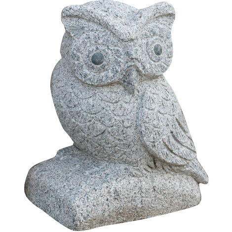 Old stone statue of an owl