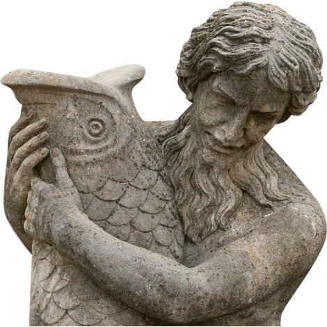 Old stone statue of a man with a fish