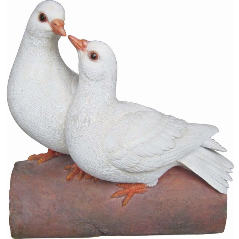 Pareja de palomas sobre una rama en resina