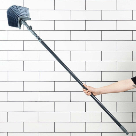 Telescopic sweeping brush with adjustable triangular brush