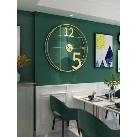 Horloge murale en métal doré