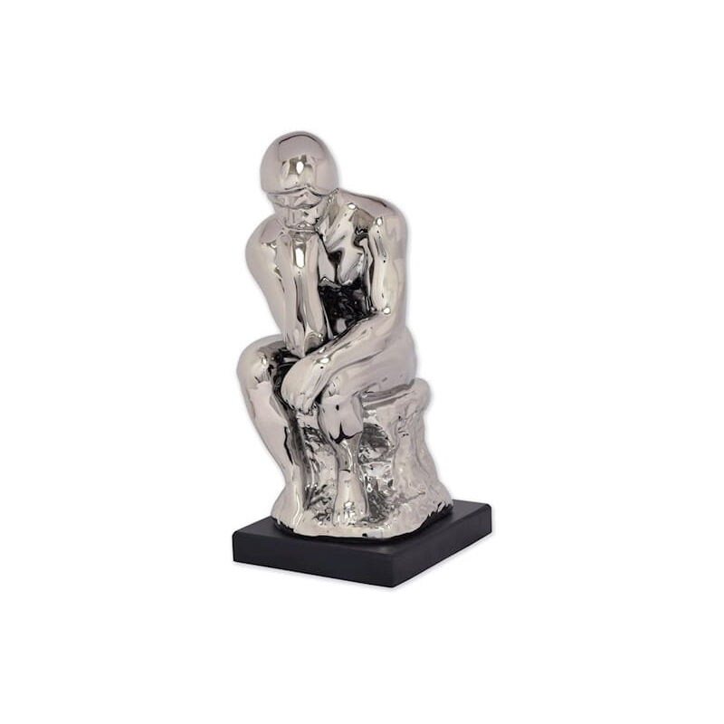Figurine en céramique d'un homme pensif