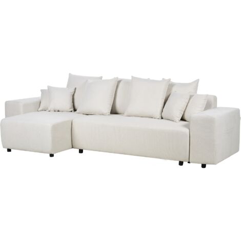 Sofá cama esquinero de tela con cojines estilo moderno a la derecha en ...